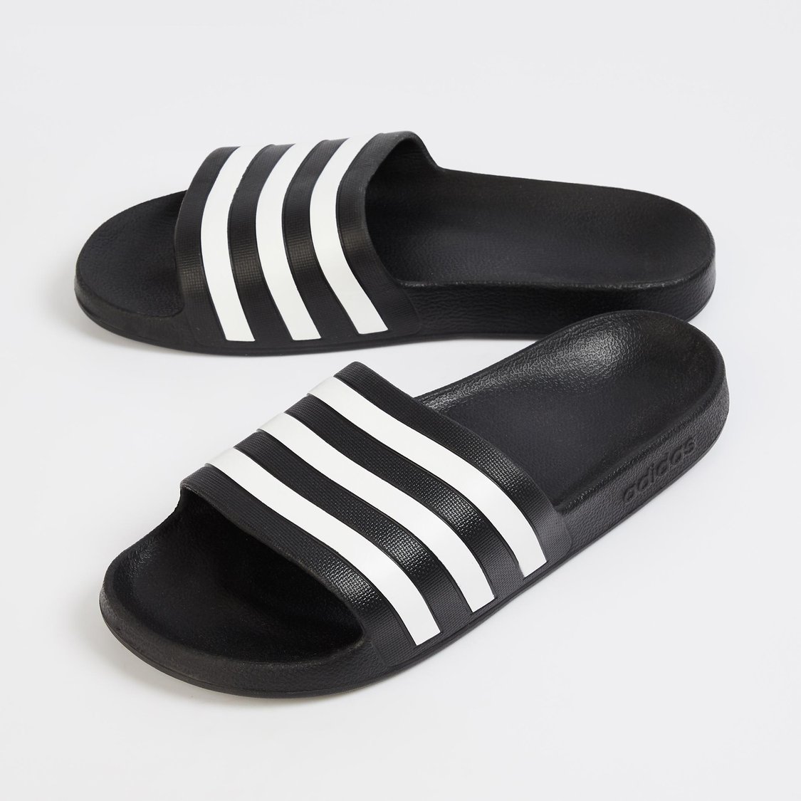 Buy ADIDAS Men Striped Pool Sliders from Adidas at just INR 1999.0