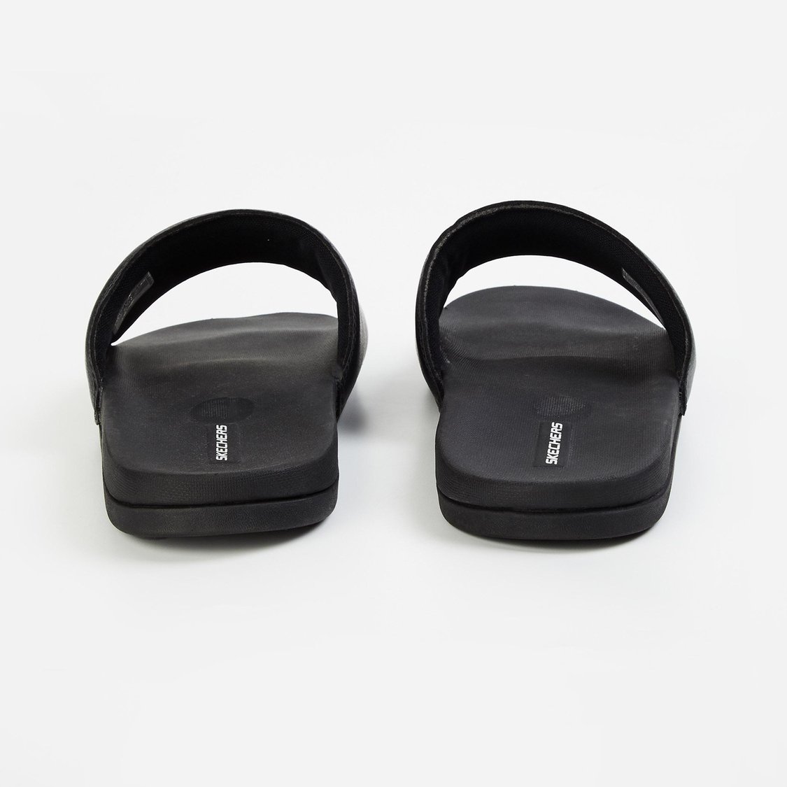 Buy SKECHERS Men Solid Sliders from Skechers at just INR 2499.0