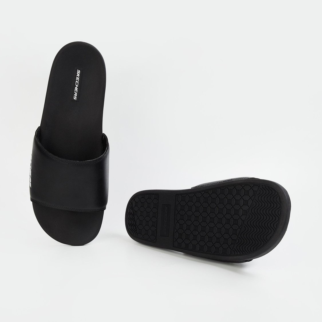 Buy SKECHERS Men Solid Sliders from Skechers at just INR 2499.0