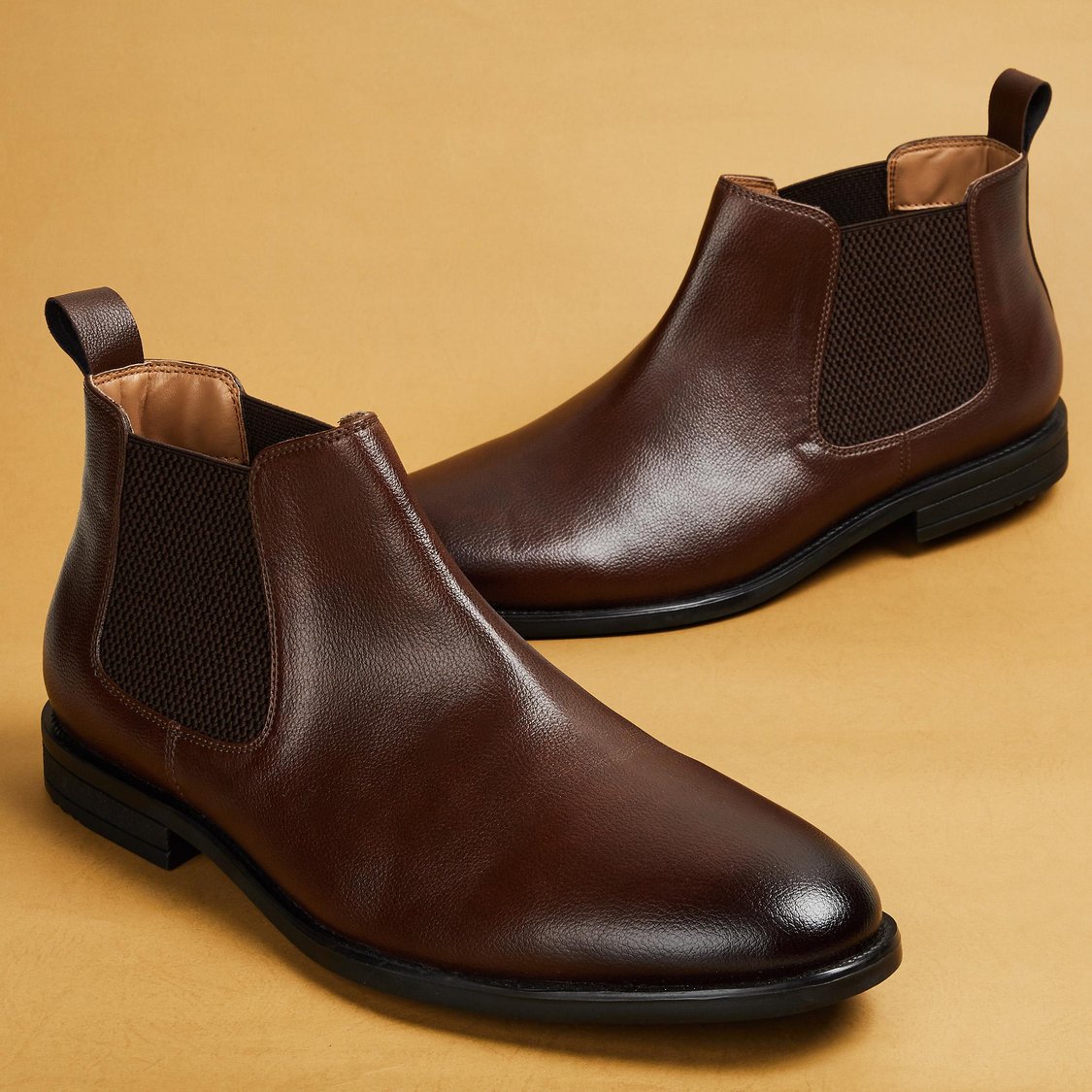 Buy CODE Men Solid Mid-Top Formal Boots from CODE at just INR 1999.0