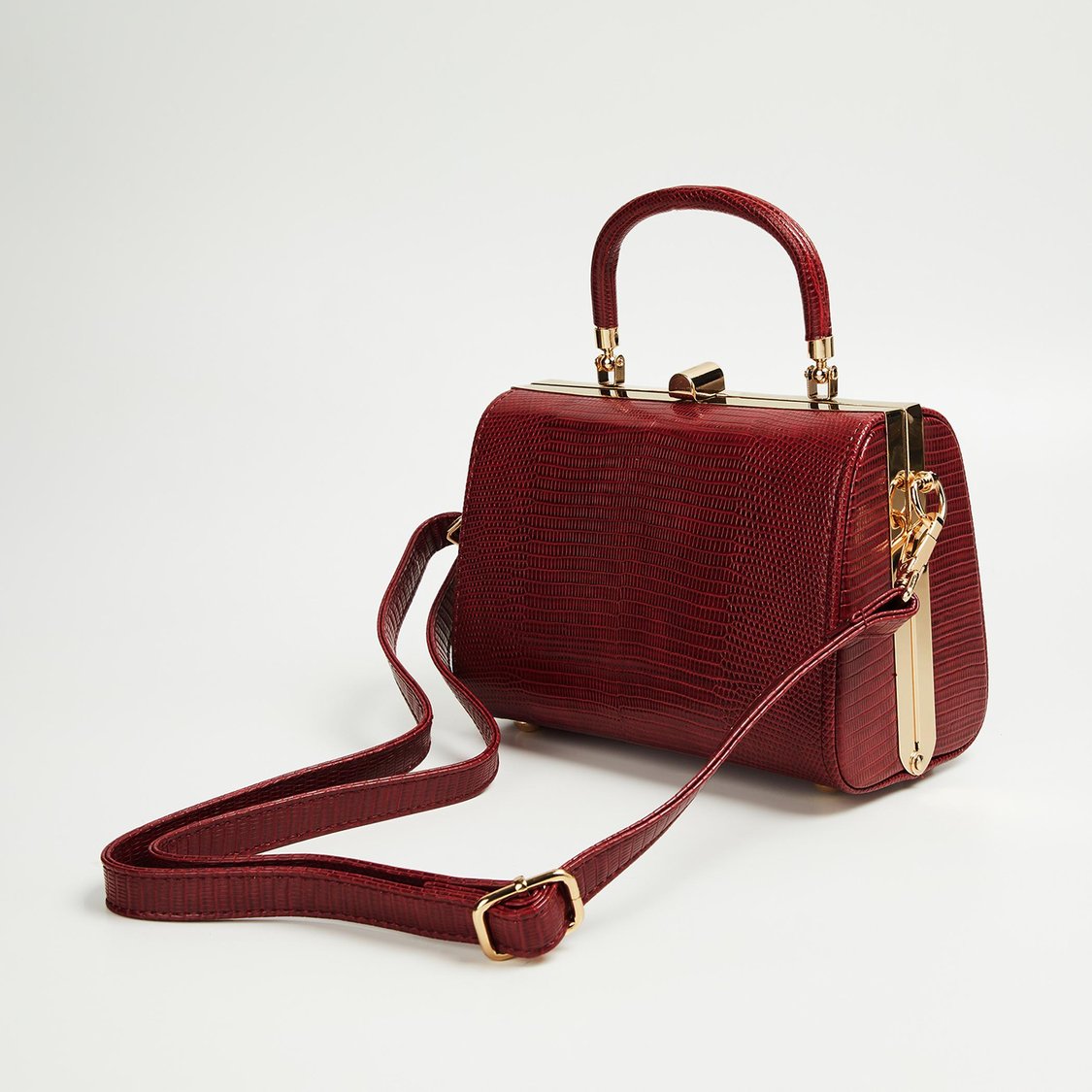 Buy CODE Women Textured Handheld Bag from CODE at just INR 2299.0
