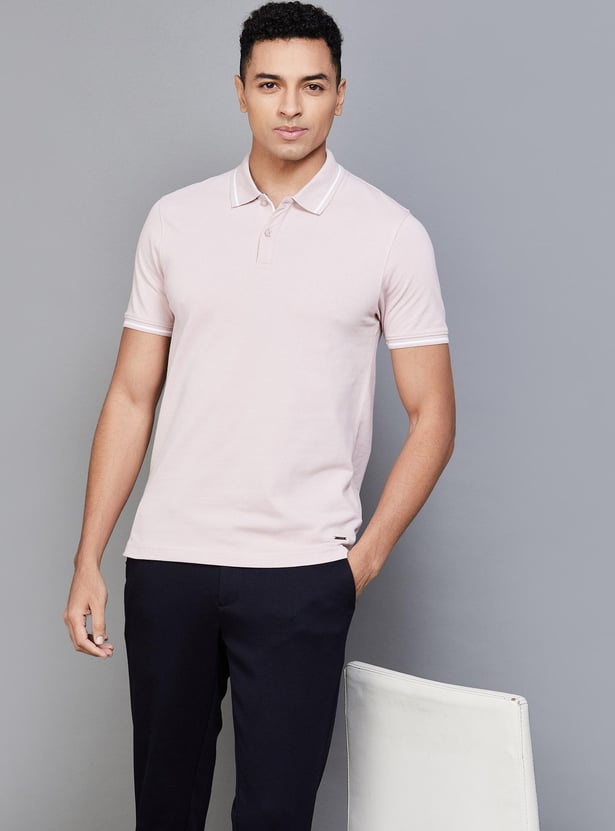 Buy CODE Solid Regular Fit Polo T-shirt from CODE at just INR 999.0