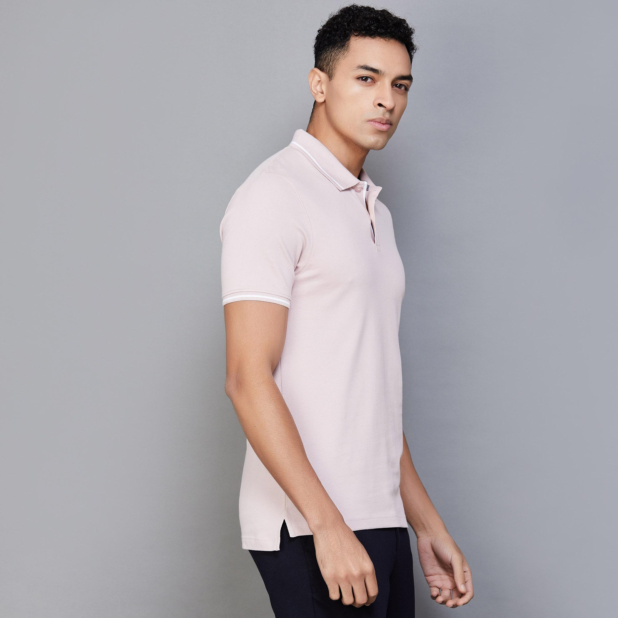 Buy CODE Solid Regular Fit Polo T-shirt from CODE at just INR 999.0