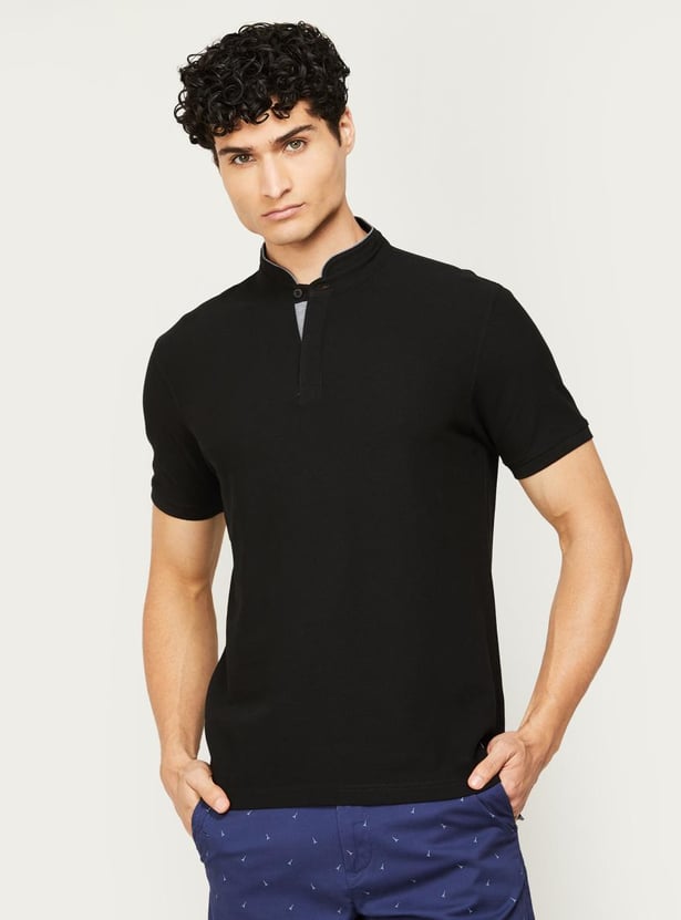 Buy CODE Solid Regular Fit T-shirt from CODE at just INR 999.0
