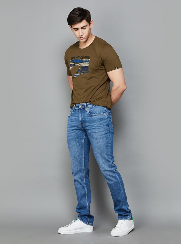 Buy LP JEANS Men Washed Slim Tapered Jeans from LP Jeans at just INR 3999.0