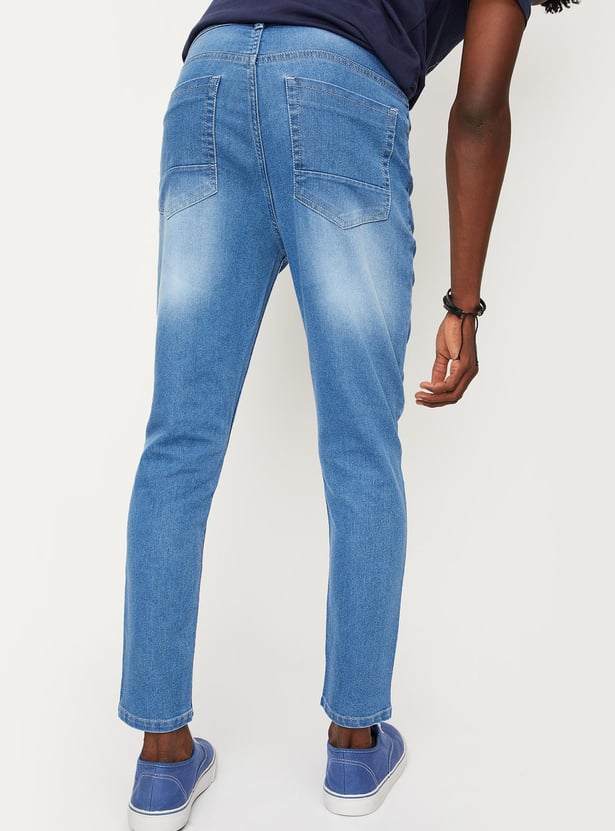 Buy Men Carrot Fit Washed Jeans Online at just Rs. 699.0 ...