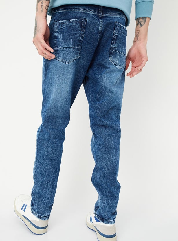 Buy Men Washed Carrot Fit Jeans Online at just Rs. 999.0 ...