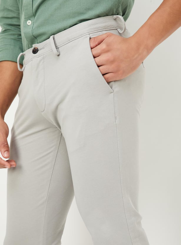 Buy Men Slim Fit Solid Stretch Chinos Online at just Rs. 1499.0 ...