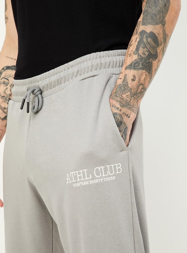 Buy Men Regular Fit Solid Athleisure Joggers Online at just Rs. 999.0 ...