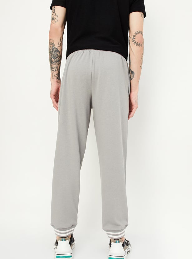 Buy Men Regular Fit Solid Athleisure Joggers Online at just Rs. 999.0 ...