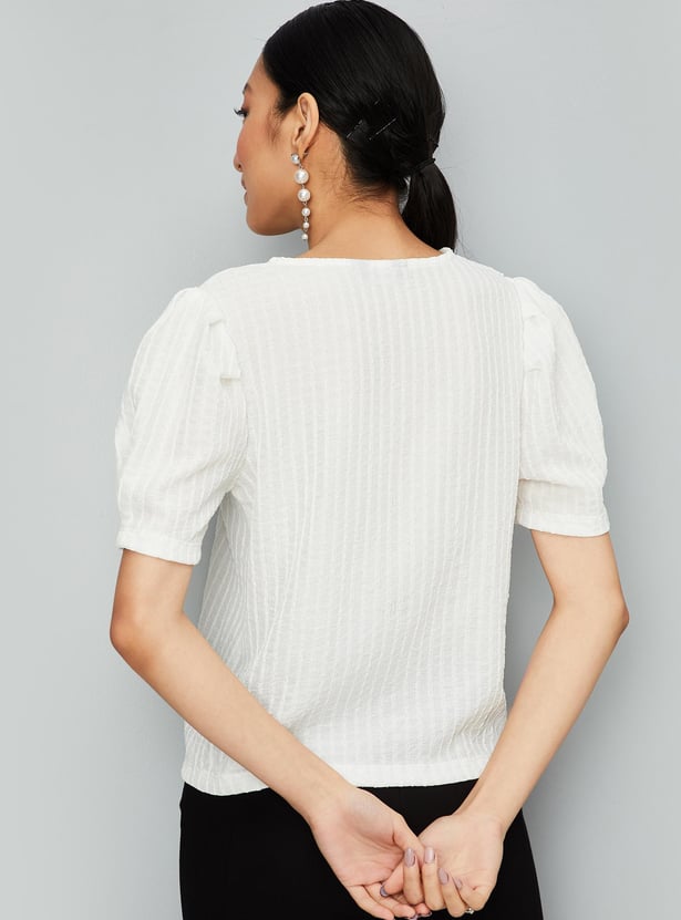 Buy Women Textured Peter Pan Collar Top Online at just Rs. 999.0 ...