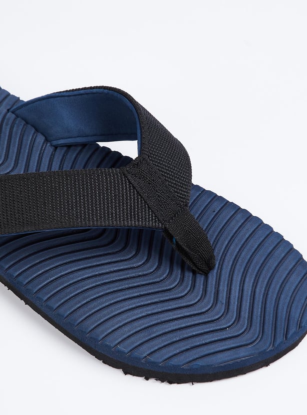 Buy Men Textured V-Strap Flip Flops Online at just Rs. 299.0 ...