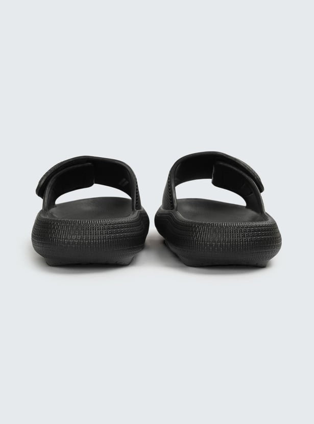 Buy Men Textured Open-Toe Sliders Online at just Rs. 499.0 ...
