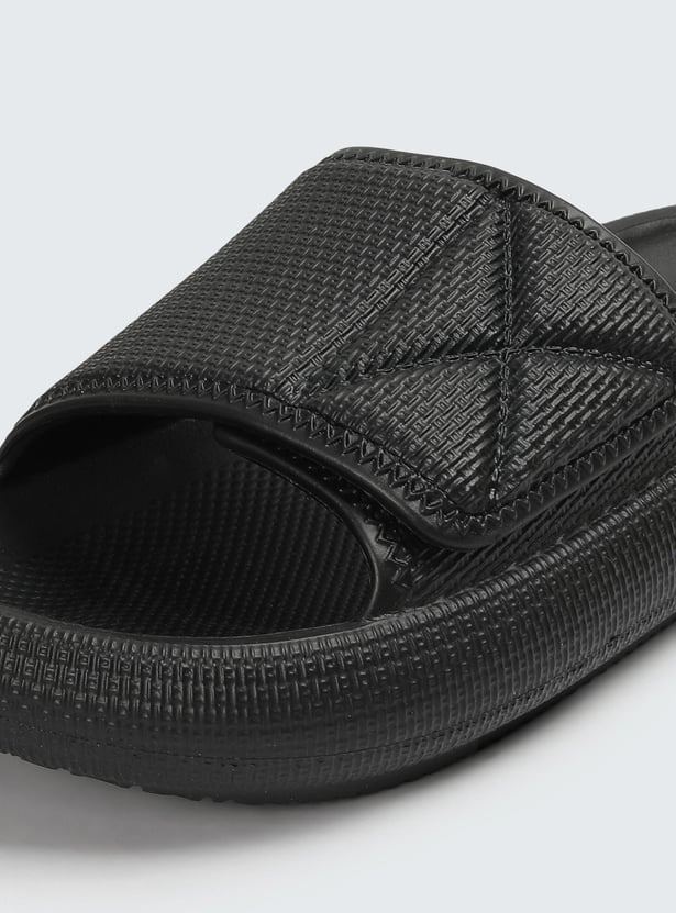 Buy Men Textured Open-Toe Sliders Online at just Rs. 499.0 ...