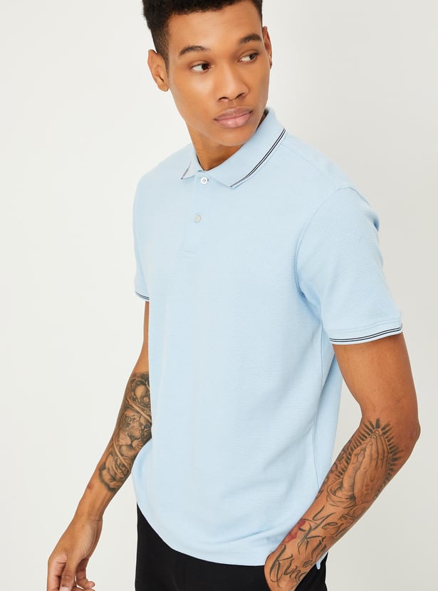 Buy Men Regular Fit Solid Polo T-shirt Online at just Rs. 499.0 ...