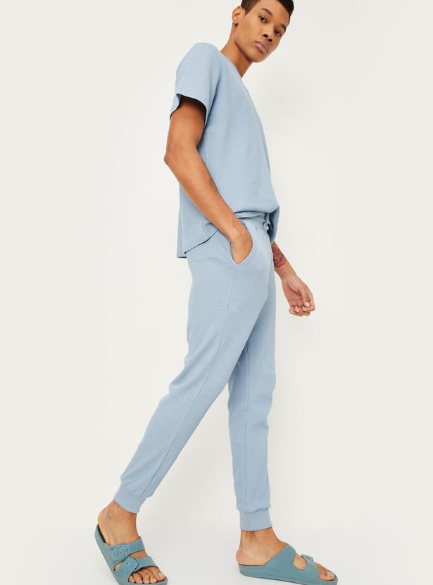 Buy Men Waffle Patterned Knit Joggers Online at just Rs. 799.0 ...