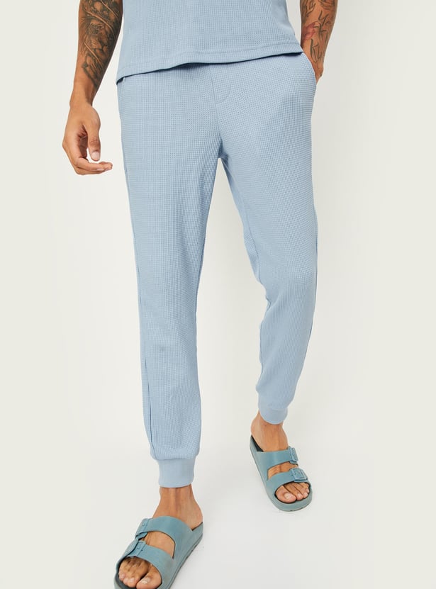 Buy Men Waffle Patterned Knit Joggers Online at just Rs. 799.0 ...