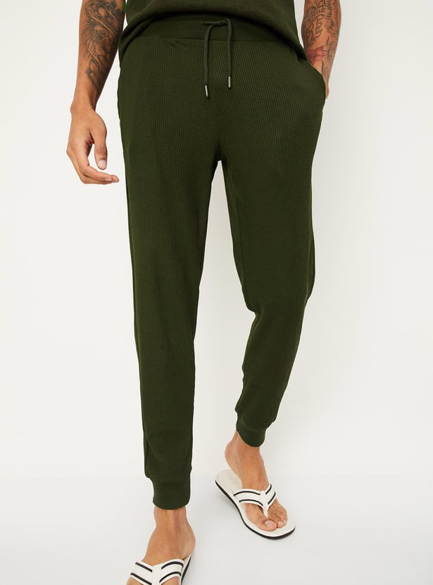 Buy Men Waffle Patterned Knit Joggers Online at just Rs. 799.0 ...