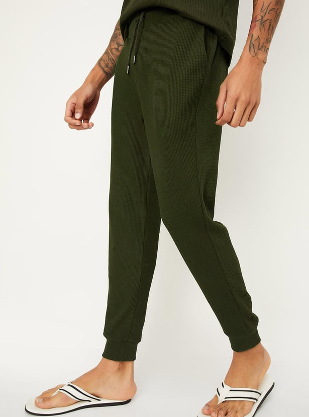 Buy Men Waffle Patterned Knit Joggers Online at just Rs. 799.0 ...
