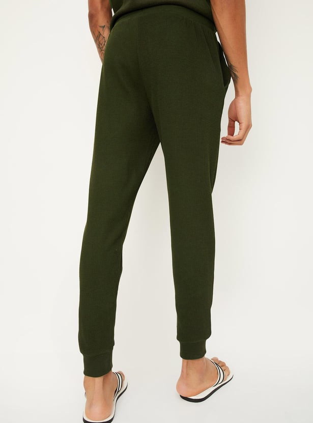 Buy Men Waffle Patterned Knit Joggers Online at just Rs. 799.0 ...