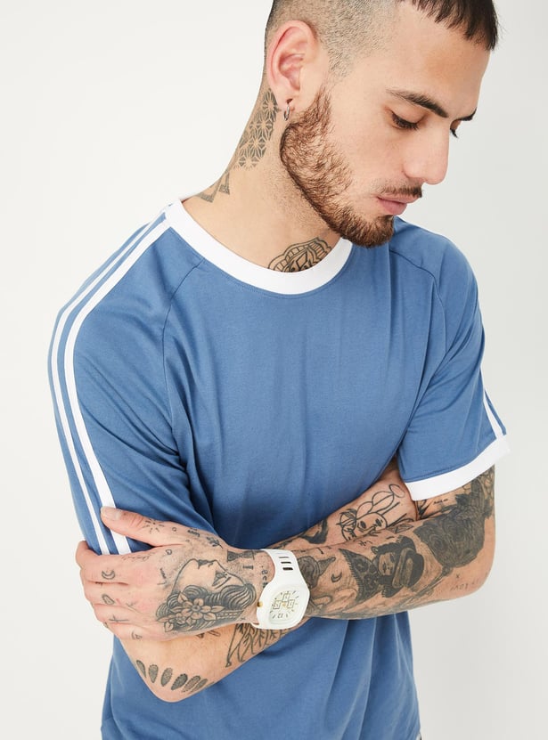 Buy Men Striped Raglan Sleeve Sports T-shirt Online at just Rs. 499.0 ...