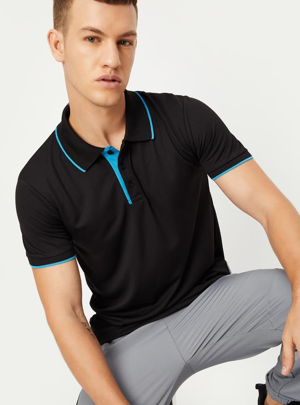 Buy Men Slim Fit Solid Active Polo T-shirt Online at just Rs. 499.0 ...