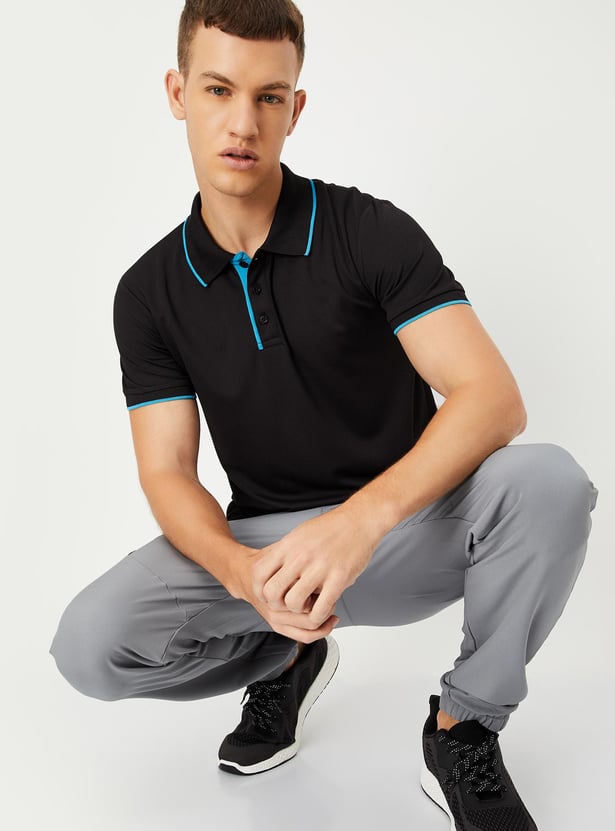 Buy Men Slim Fit Solid Active Polo T-shirt Online at just Rs. 499.0 ...