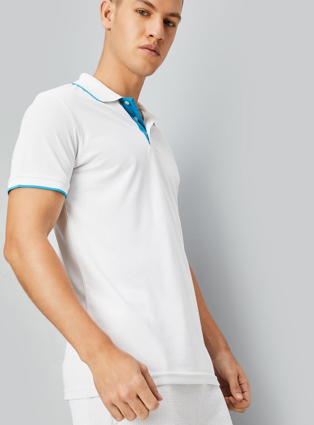 Buy Men Slim Fit Solid Active Polo T-shirt Online at just Rs. 499.0 ...