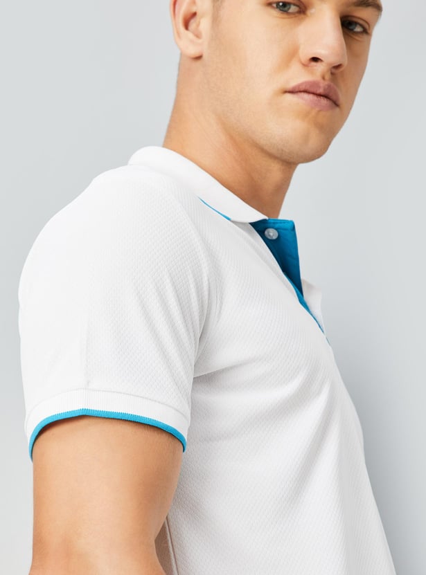 Buy Men Slim Fit Solid Active Polo T-shirt Online at just Rs. 499.0 ...