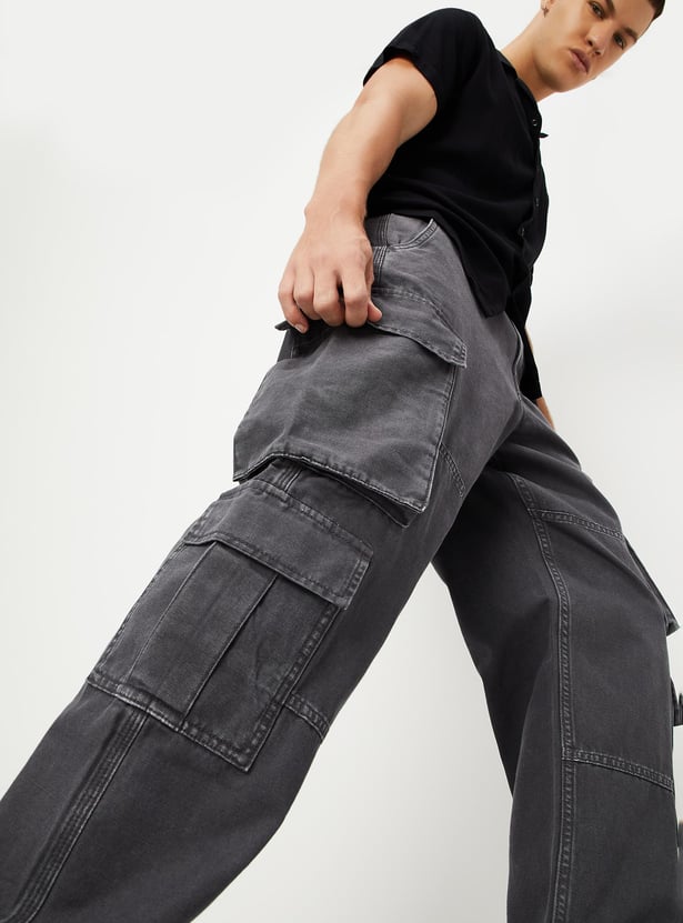 Buy Men Relaxed Fit Solid Cargo Jeans Online at just Rs. 1699.0 ...